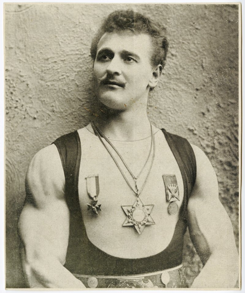 Sandow portrait with medals | Rogue Canada