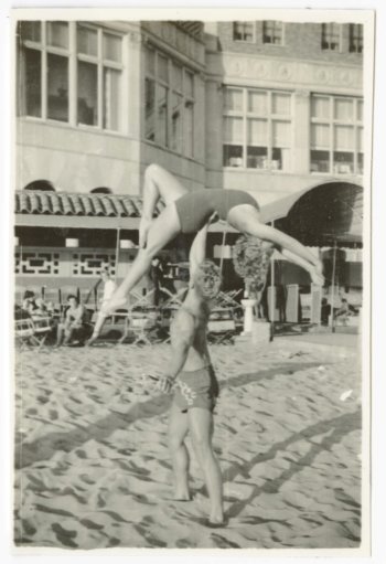 Les Stockton lifting Pudgy on beach | Rogue Fitness Canada