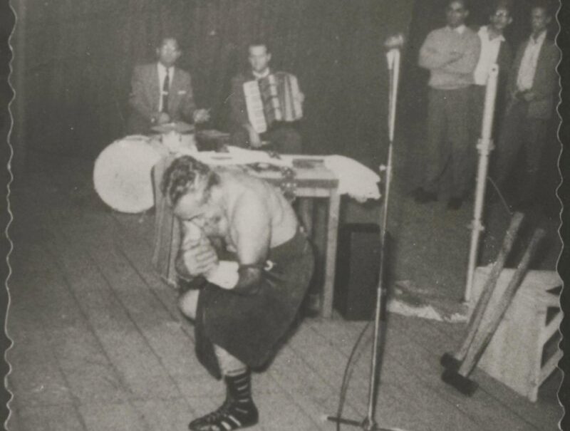 The Mighty Atom performing feat of strength | Rogue Fitness Canada